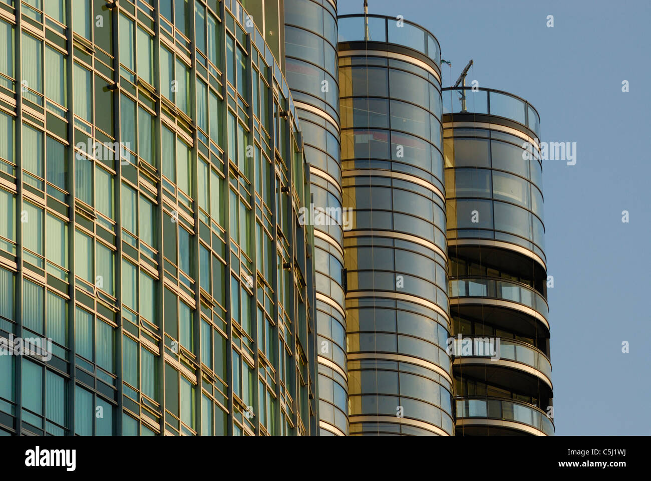 Curved architectural lines form this modern glass building Stock Photo ...