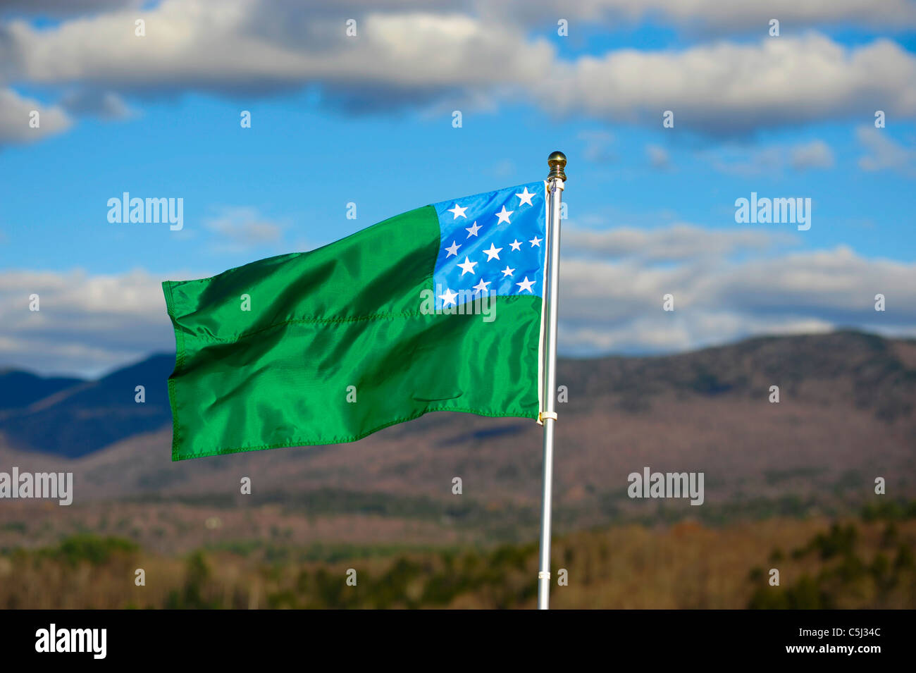 Green Mountain Flag of Vermont against Worcester Range, Waterbury Stock ...