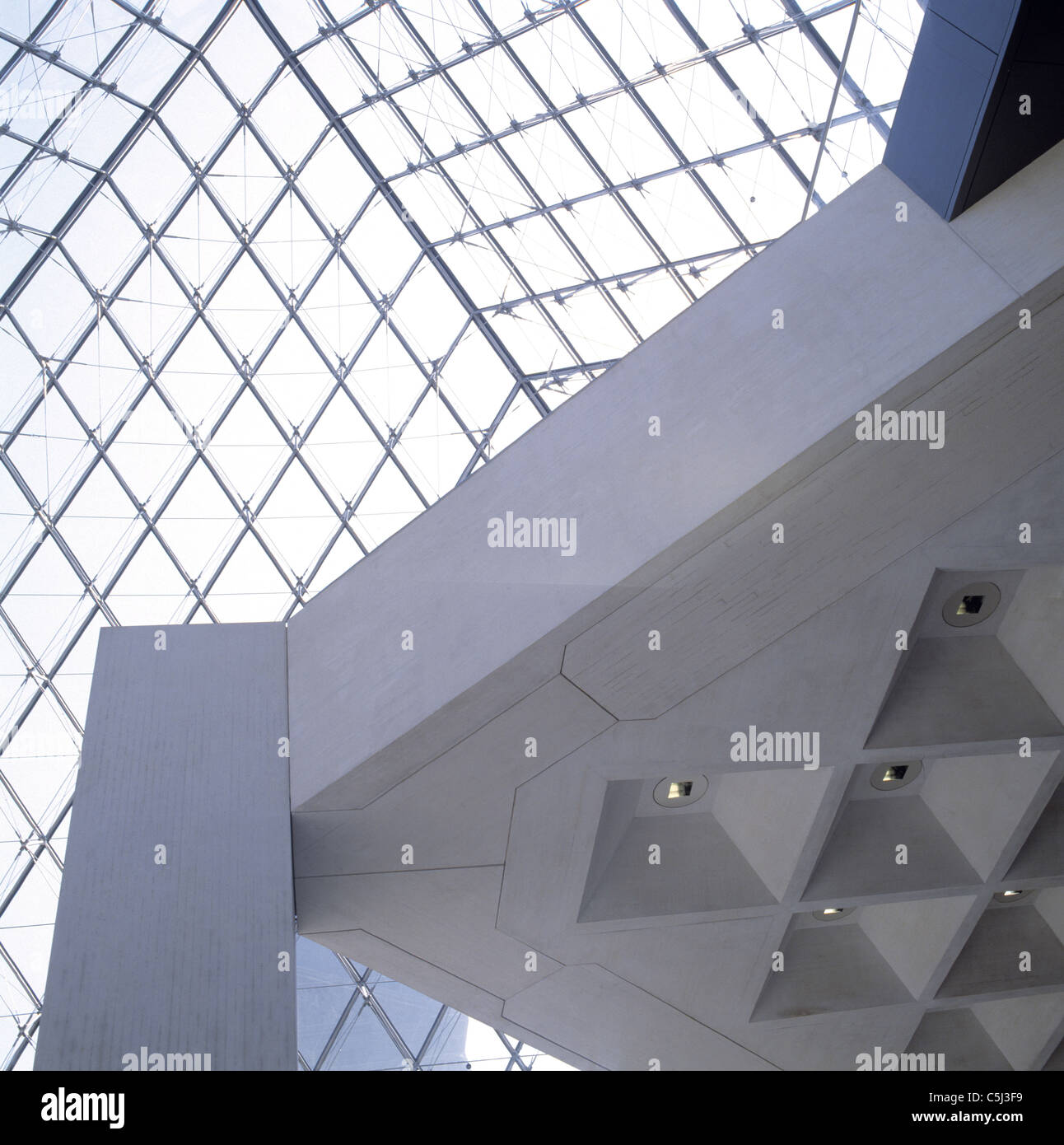 Detail of Louvre in Paris looking towards roof of pyramid extension ...