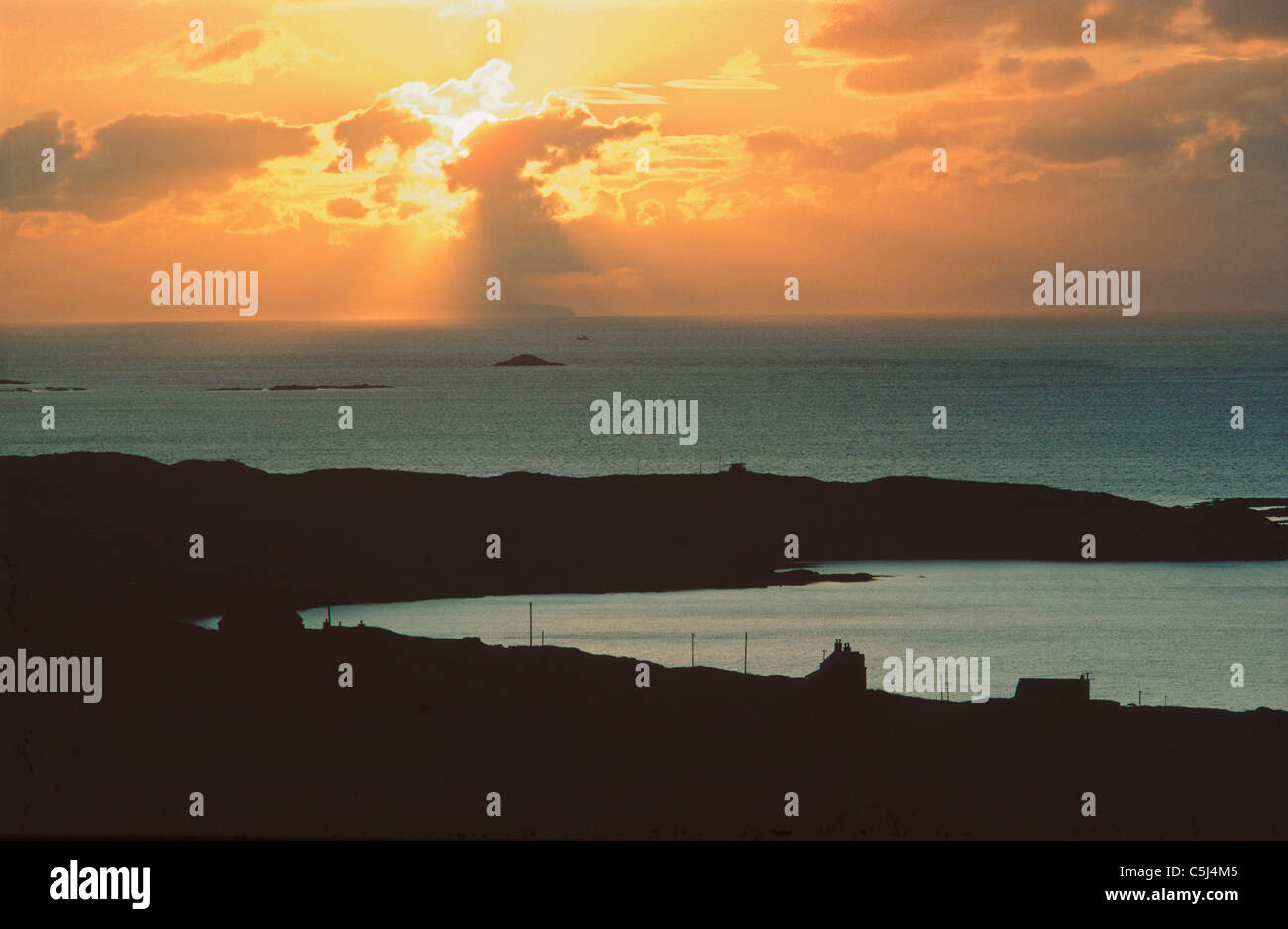 Dramatic sunrise over the Minch seen from the east coast of Barra ...