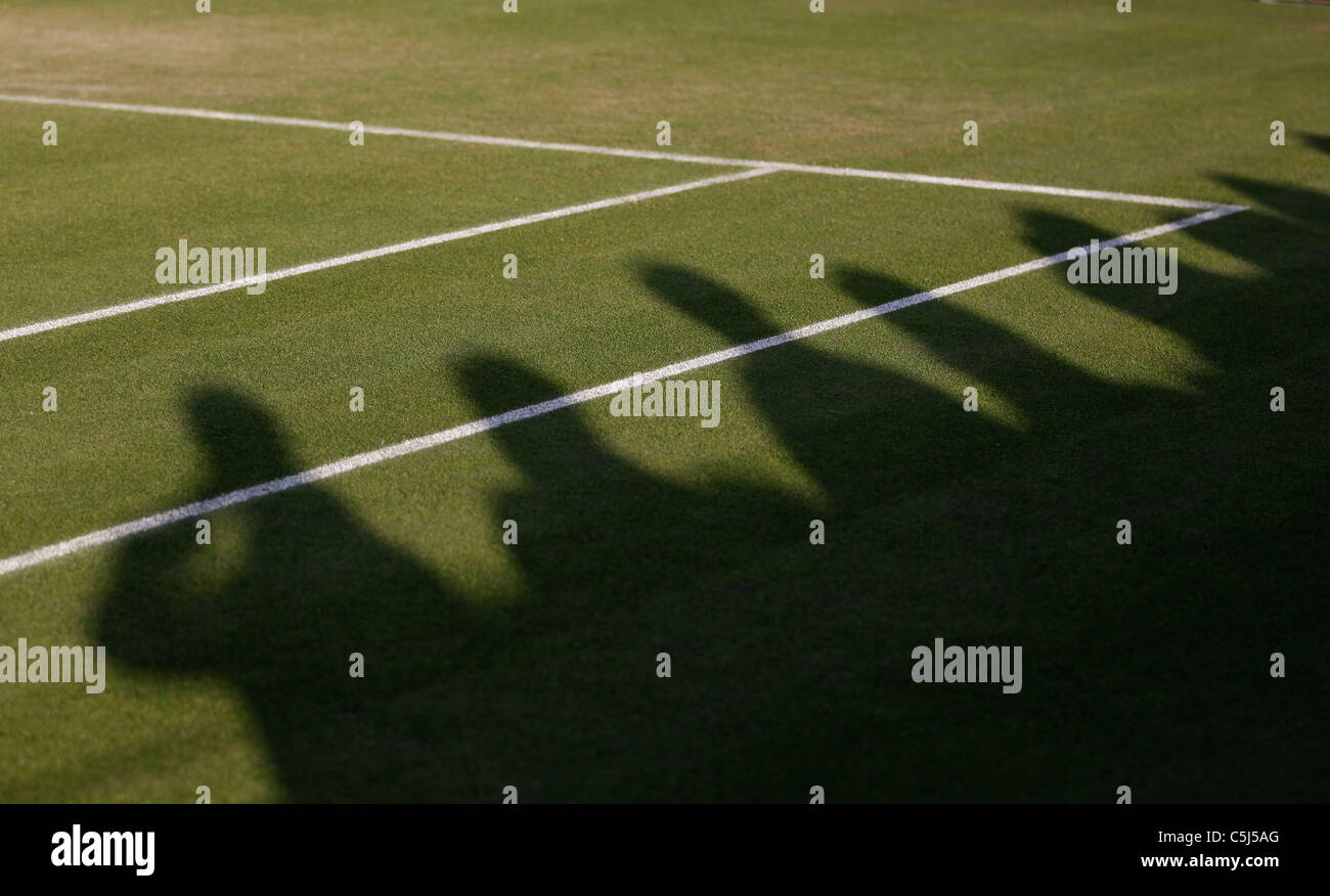 Shadow of spectators at the Wimbledon Championships Stock Photo - Alamy