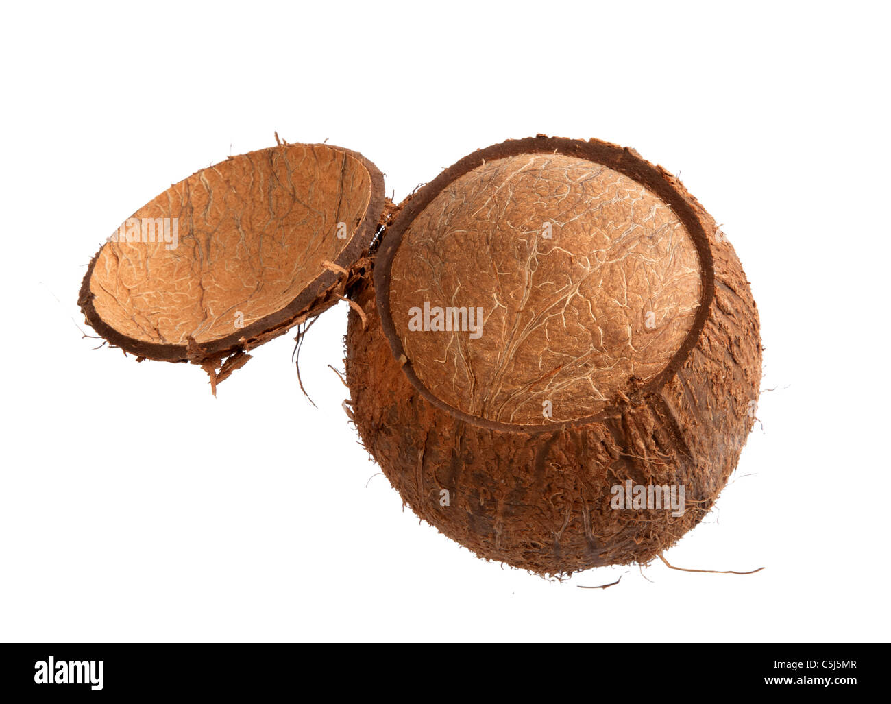 Half open coconut isolated on white Stock Photo - Alamy