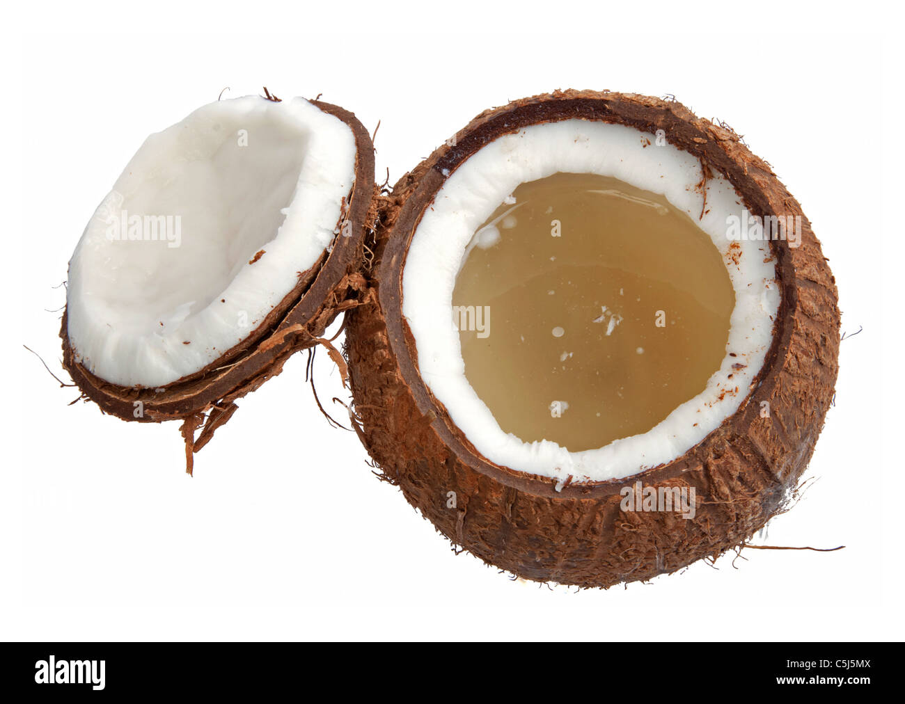 Half open coconut isolated on white Stock Photo - Alamy