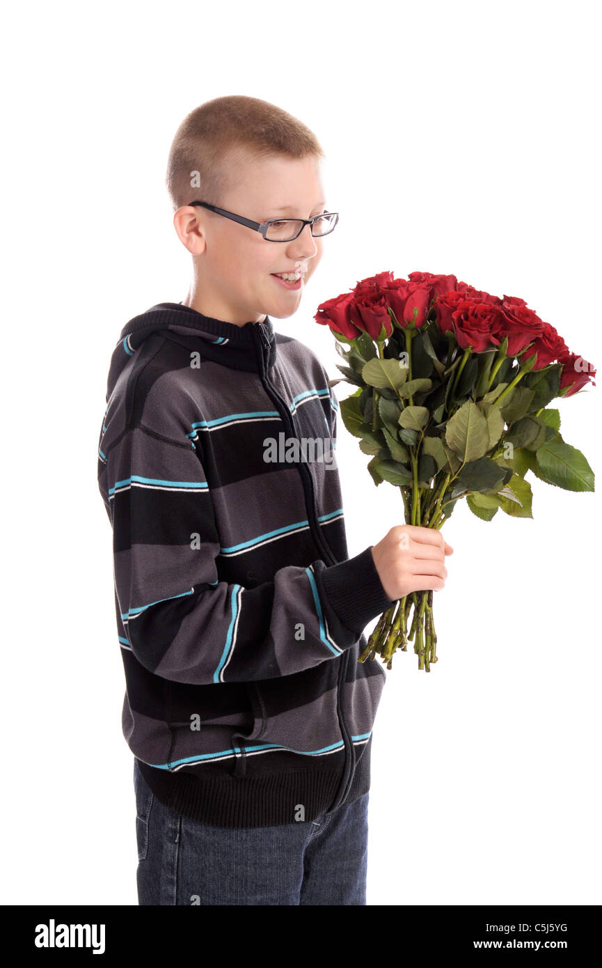 Mothers day : boy with bouquet of red roses Stock Photo - Alamy
