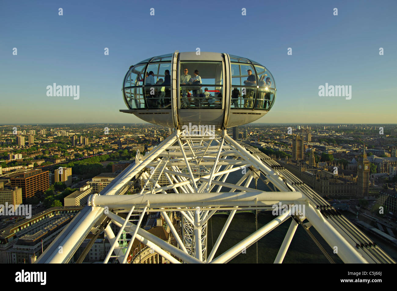 Close-up on a section of the main wheel and one of the passenger cabins ...