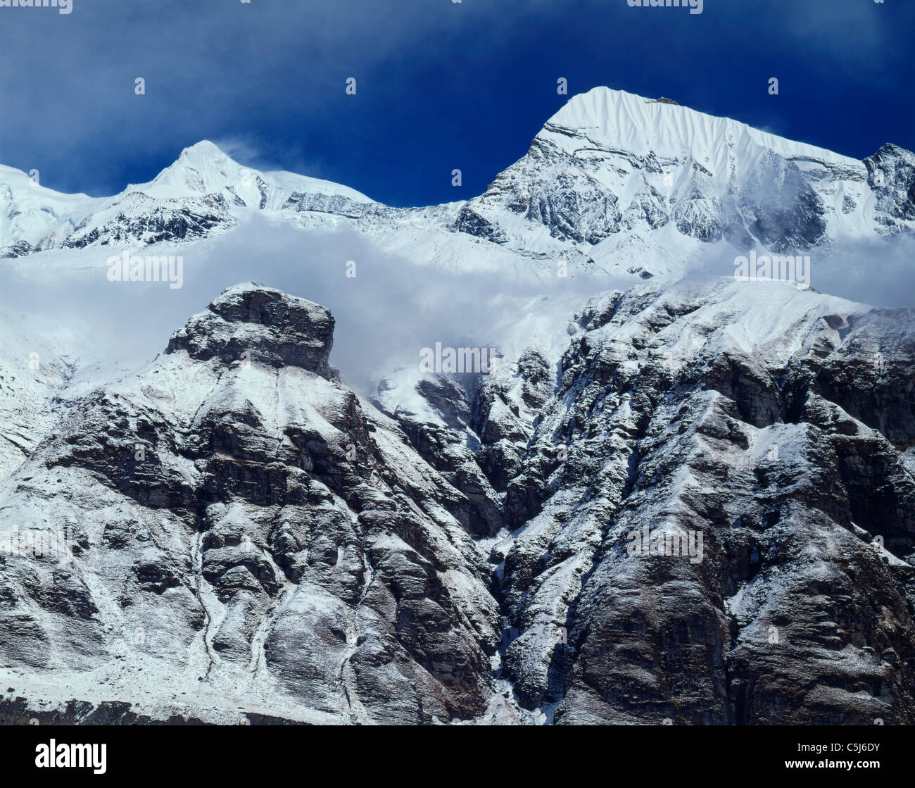 The inner peaks of the Annapurna Sanctuary, Tent Peak )left) and ...