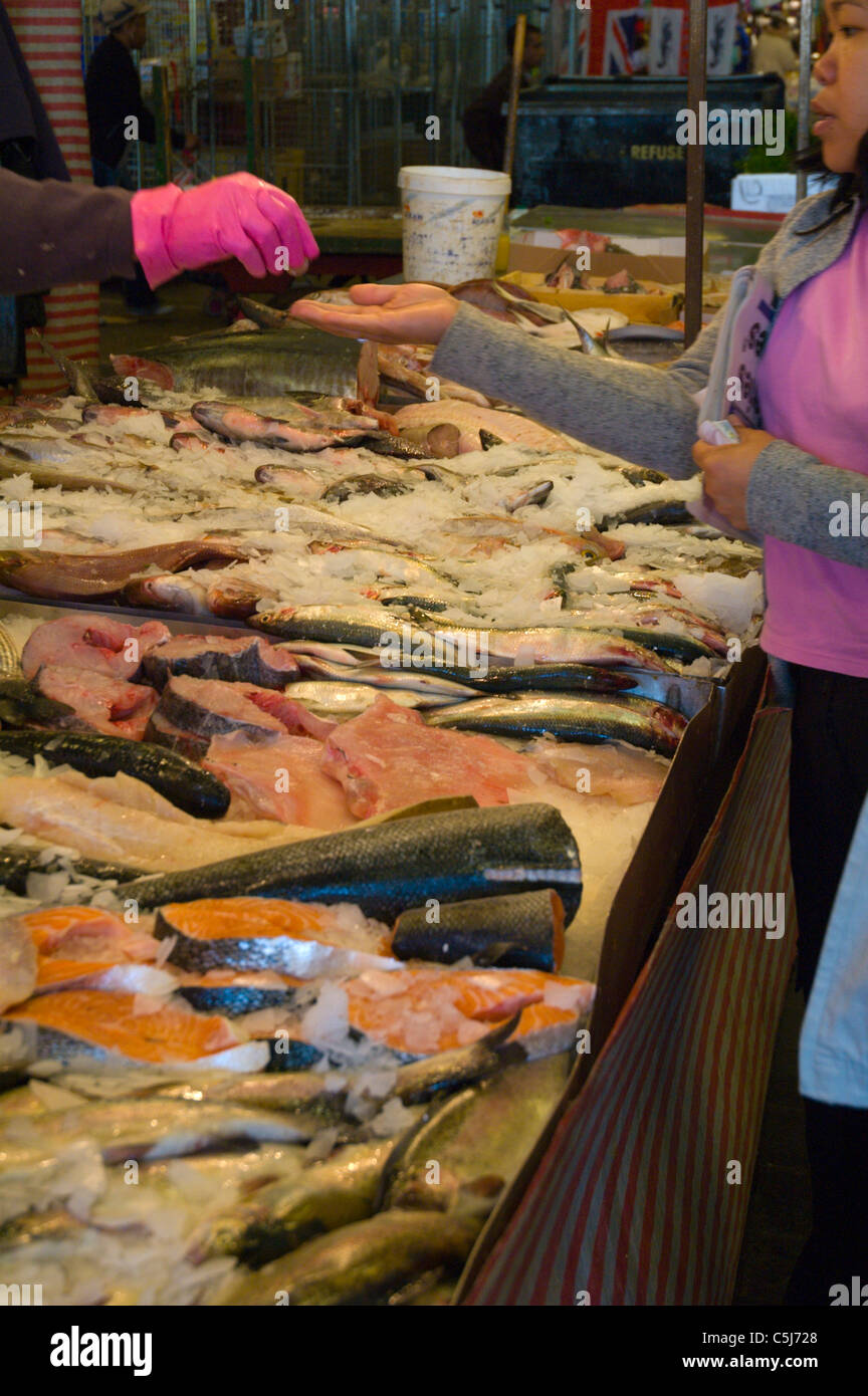Shopping for seafood market Upton Park east London England UK Europe ...