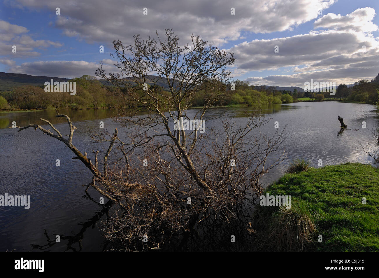 View of the wide River Lochay near its junction with Loch Tay, with ...