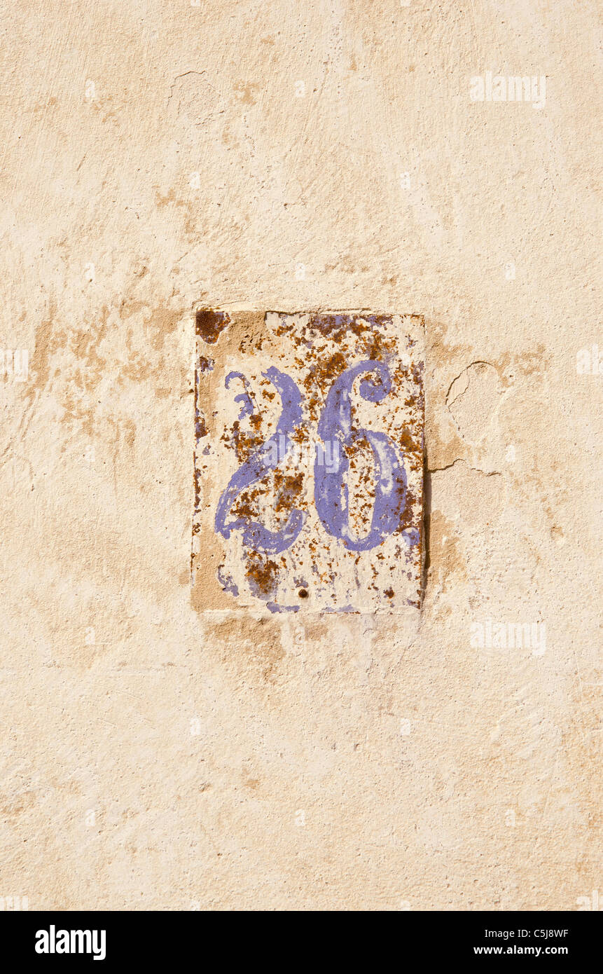 historical house street number 26 and wall background Stock Photo - Alamy
