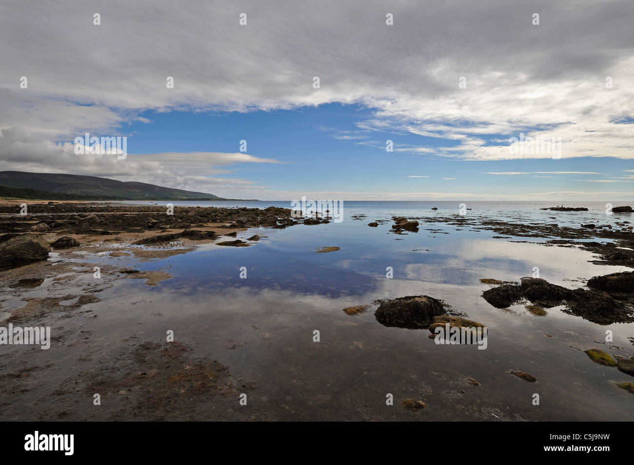 Rocks, sea and sky at Golspie, Sutherland, Scotland, UK Stock Photo - Alamy