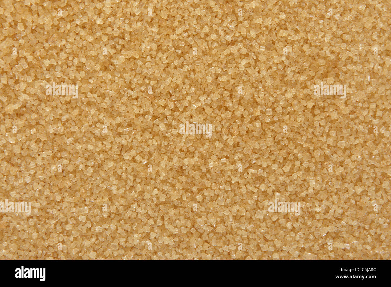 Brown sugar background Stock Photo - Alamy