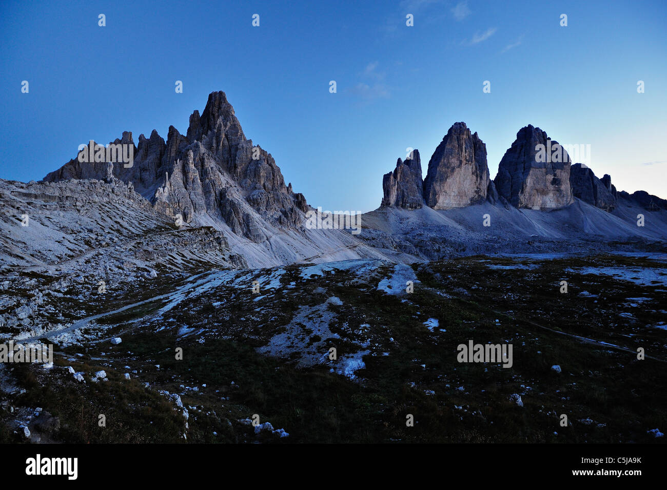 Night sky over Monte Paterno and the Tre Cime di Lavaredo in the Sesto ...