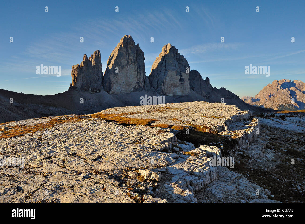 Early morning sunlight on a broad natural limestone pavement below the ...