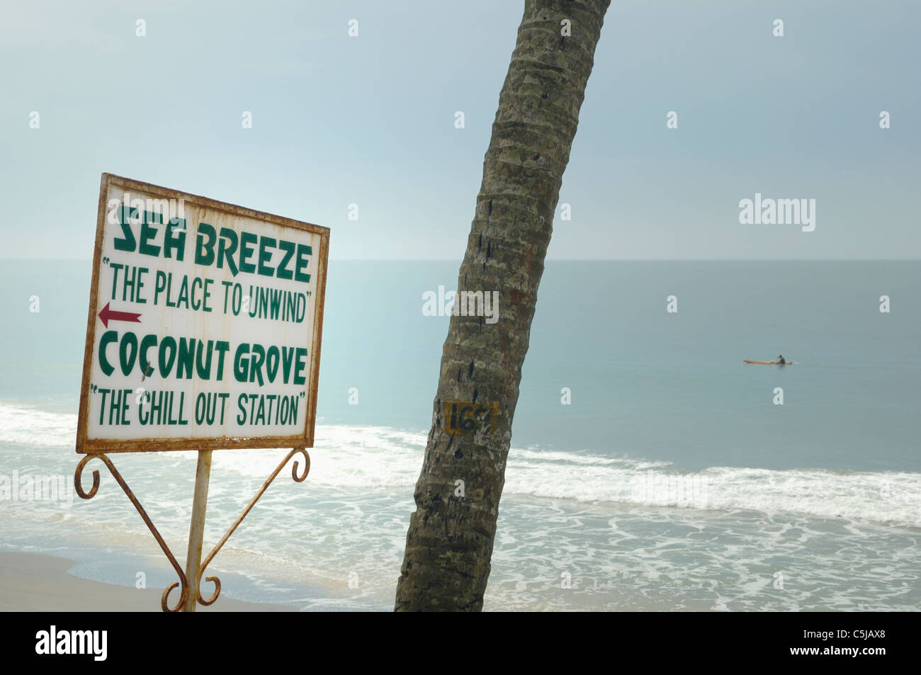 Sign against sea and sky promoting The Chill Out Station. Varkala beach ...