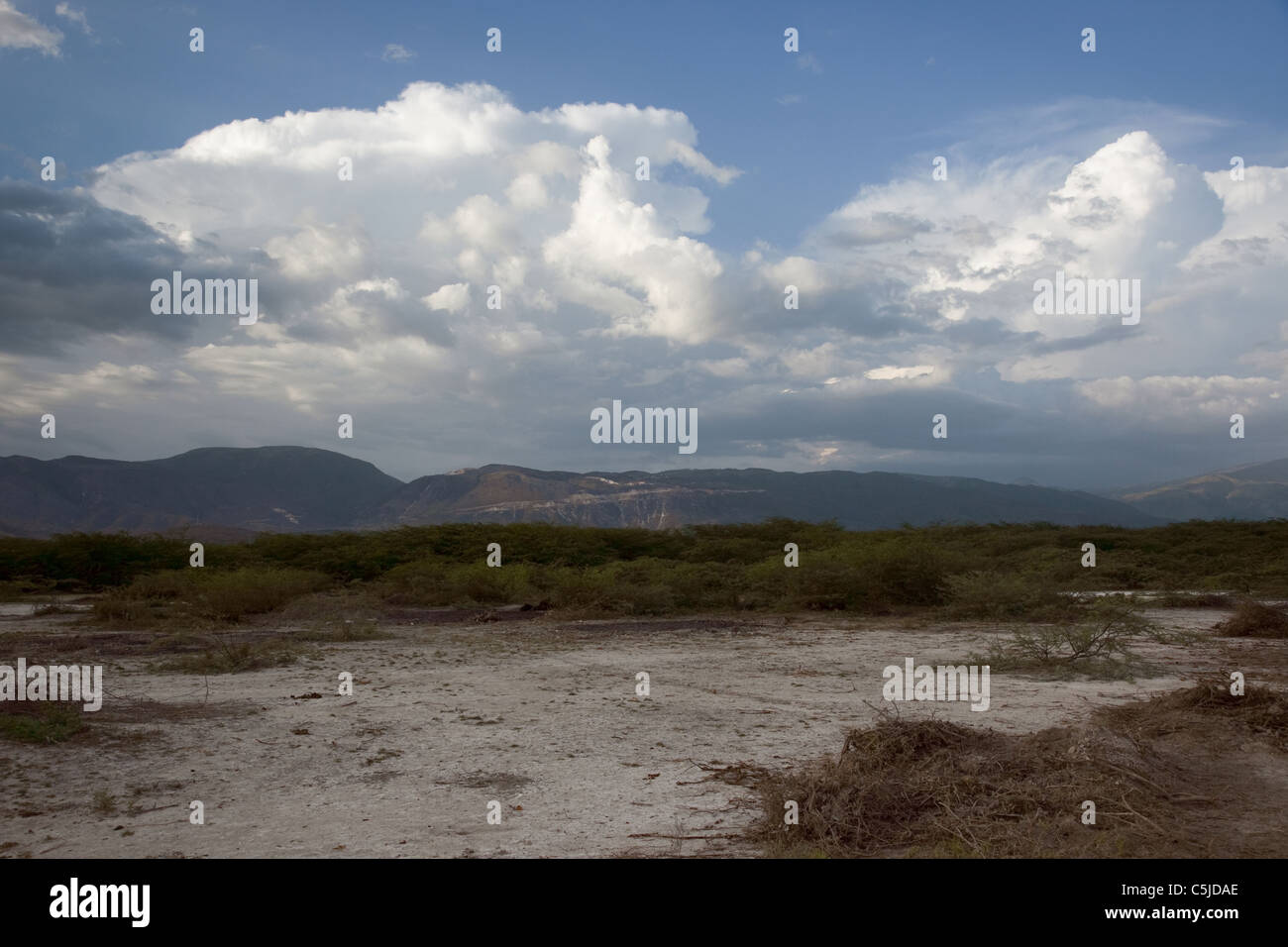 Clouds over a desolate Haitian countryside Stock Photo - Alamy