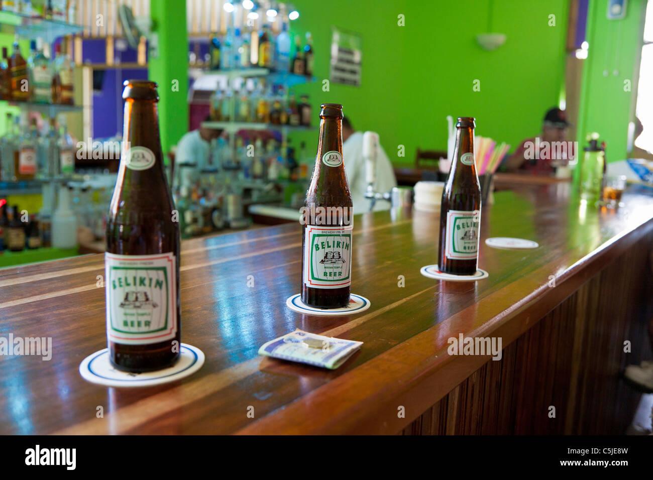 Three bottles of Belikin beer on bar in Belize City, Belize Stock Photo ...