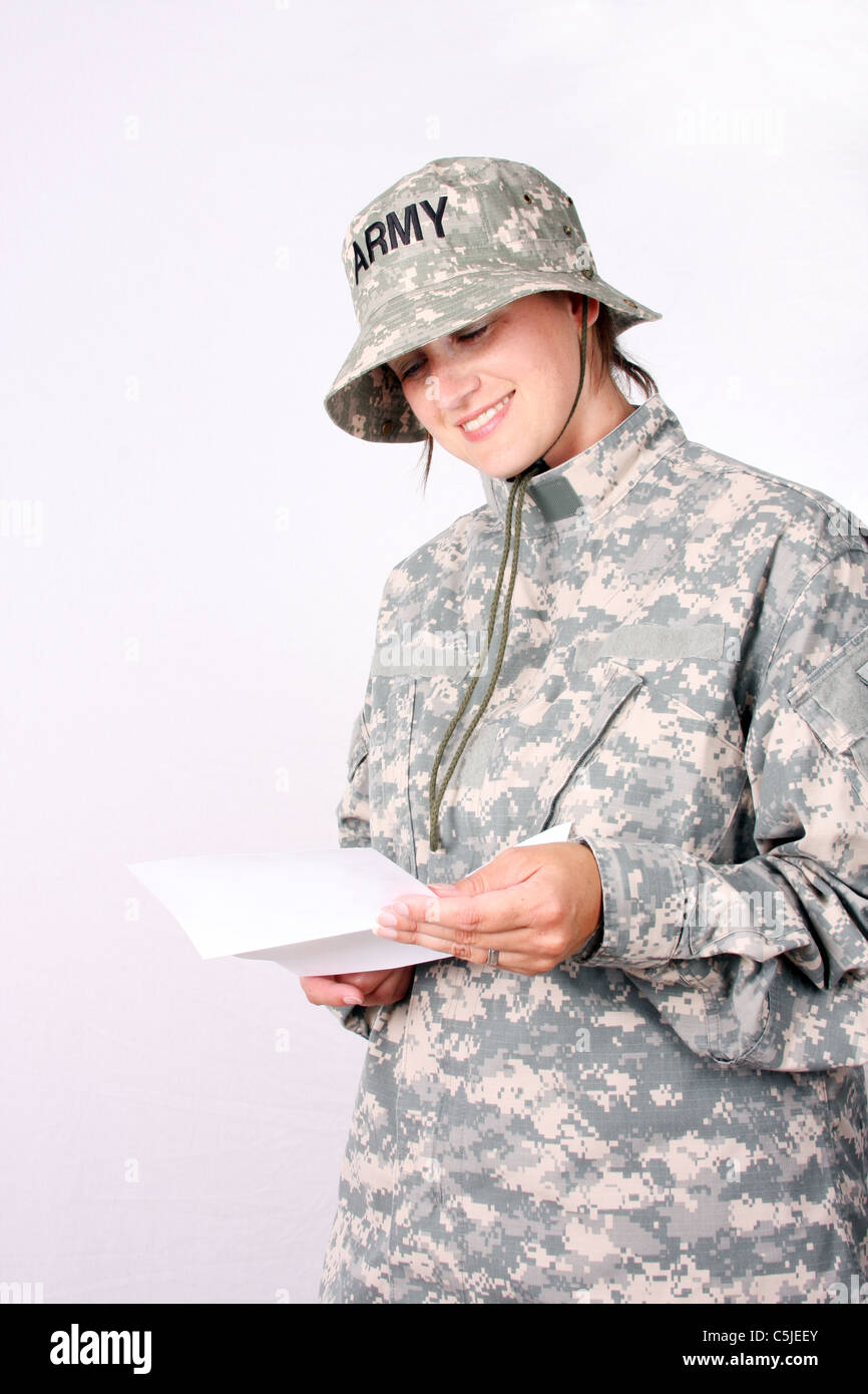 An adult soldier reading a letter from home Stock Photo - Alamy