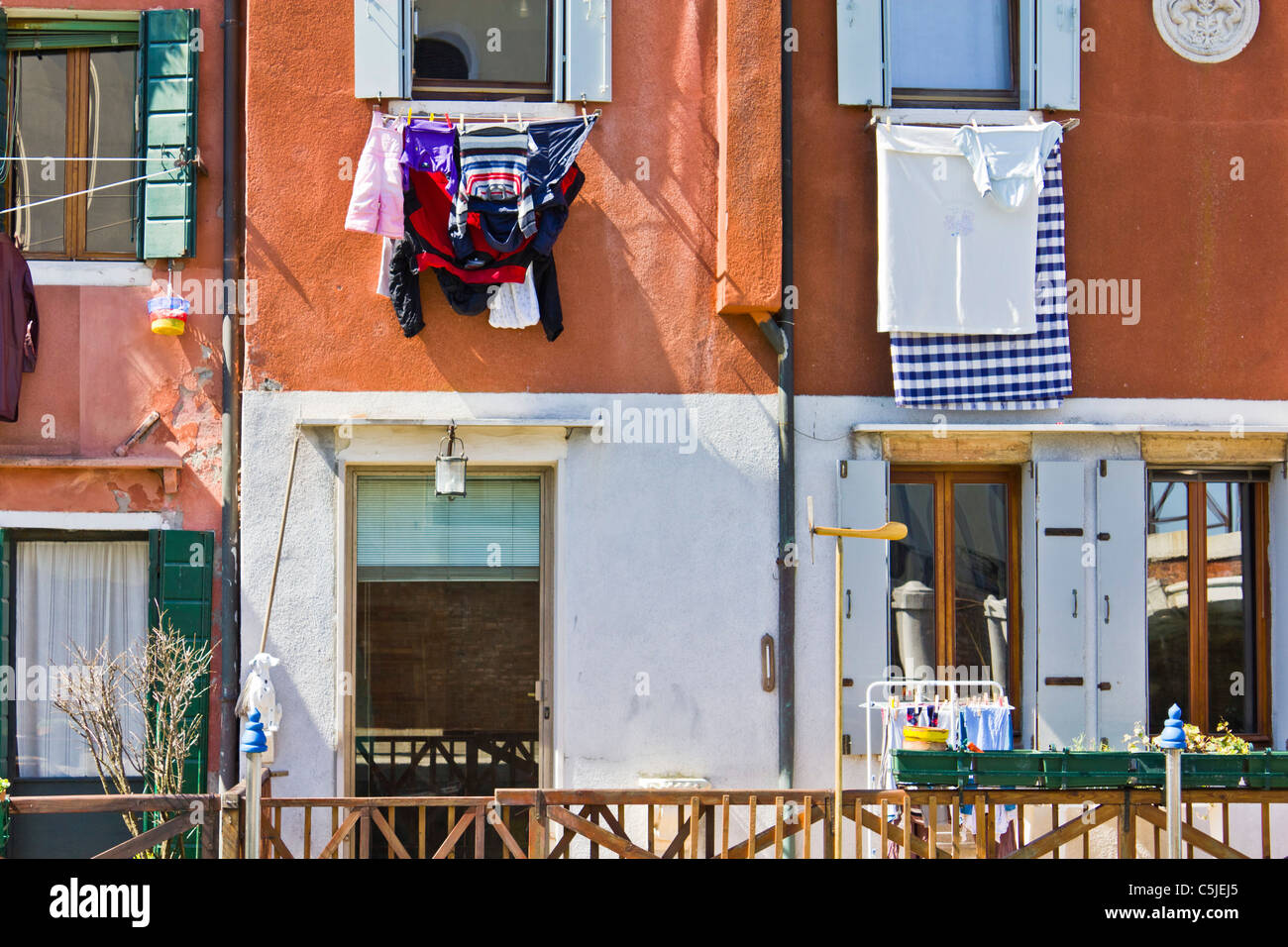 VENICE ITALY-APR 06 2011: Washing hanging from lines under house ...