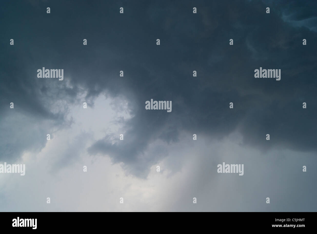 Storm clouds moving in Stock Photo - Alamy