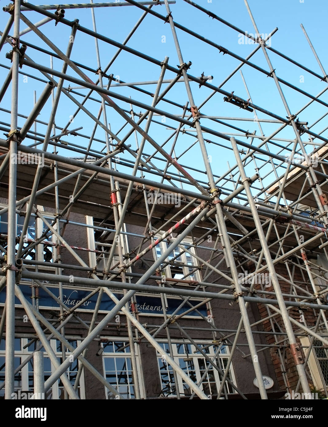 Scaffolding around a fire damaged building Stock Photo - Alamy