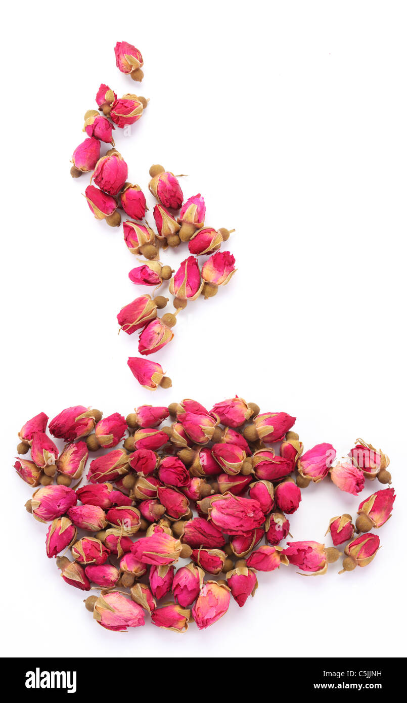 Heap of roses in a form of cup and steam isolated on a white background ...