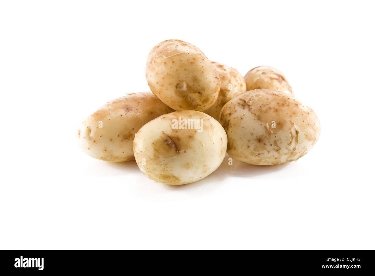 potatoes on a white background Stock Photo - Alamy