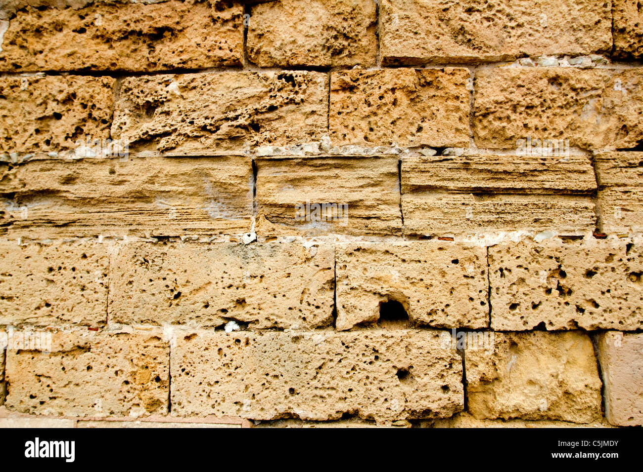 Mares sandstone stone masonry wall in Majorca Balearic islands Stock ...