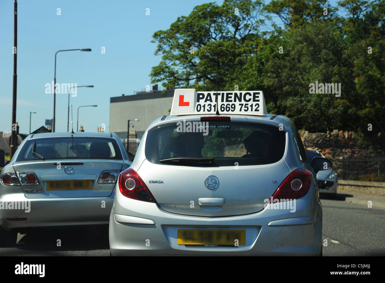 Patient driving instructor Stock Photo - Alamy