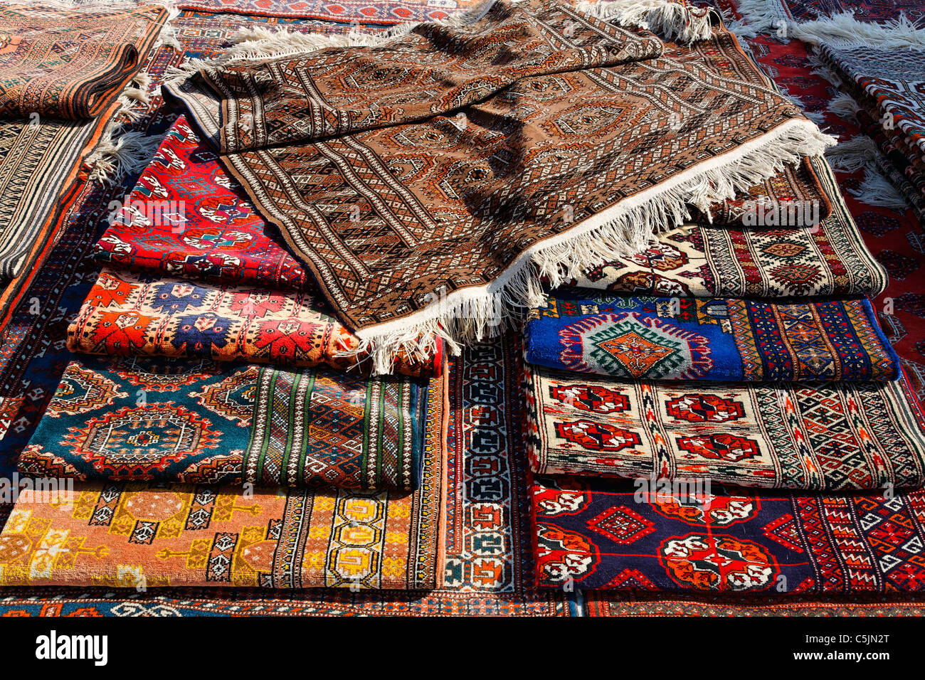Turkmenistan - Ashgabat - Sunday Market carpet stall Stock Photo - Alamy