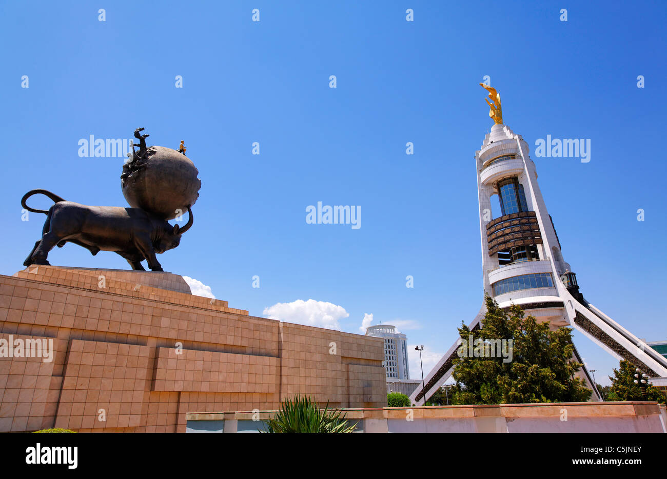 Turkmenistan - Ashgabat - the Earthquake memorial statue and the Arch ...