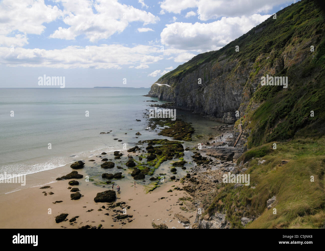 Rocks and cliffs at Pendine Beach in South Wales Stock Photo - Alamy