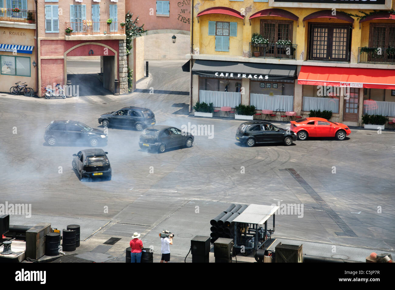 Action sequence stunt car motorbike show with explosions, jumps and ...