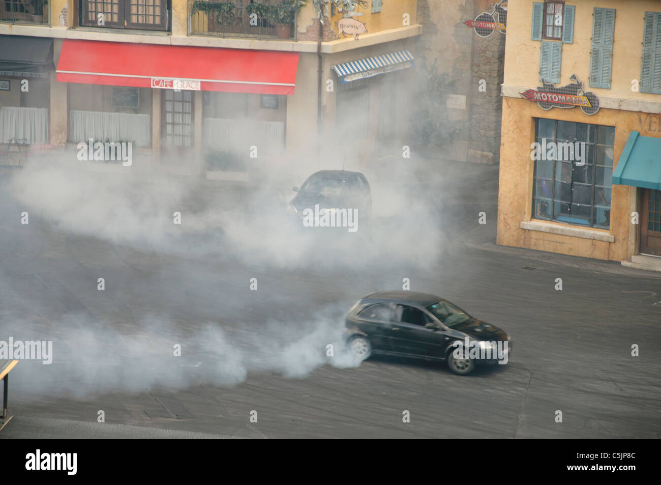 Action sequence stunt car motorbike show with explosions, jumps and ...