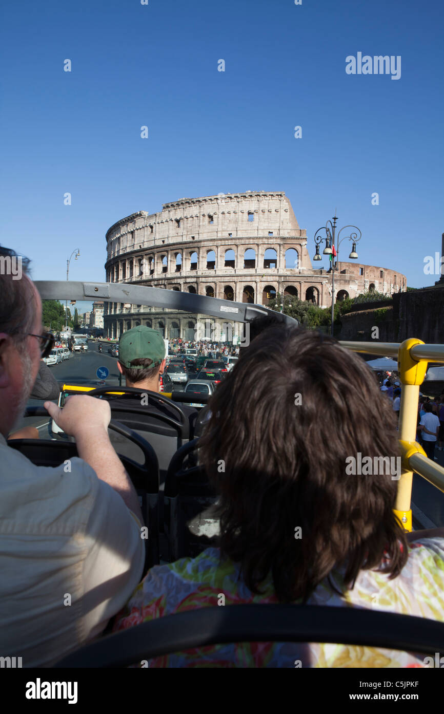 Colosseum in Rome seen from top double decker bus Stock Photo - Alamy