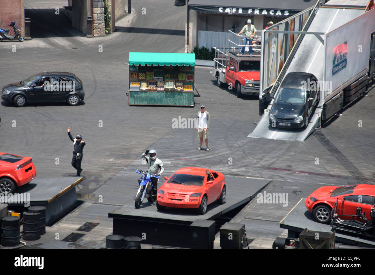 Action sequence stunt car motorbike show with explosions, jumps and ...