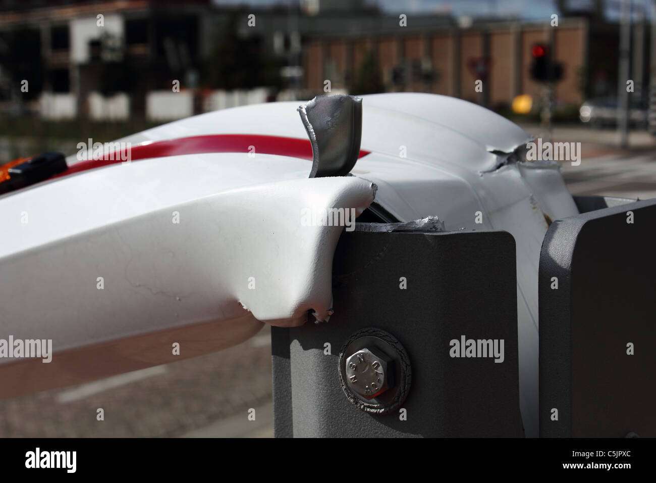 bent road barrier , conceptual image, metaphor Stock Photo - Alamy