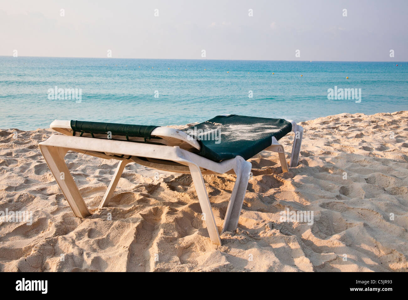 Beach chair overlooking the sea Stock Photo - Alamy