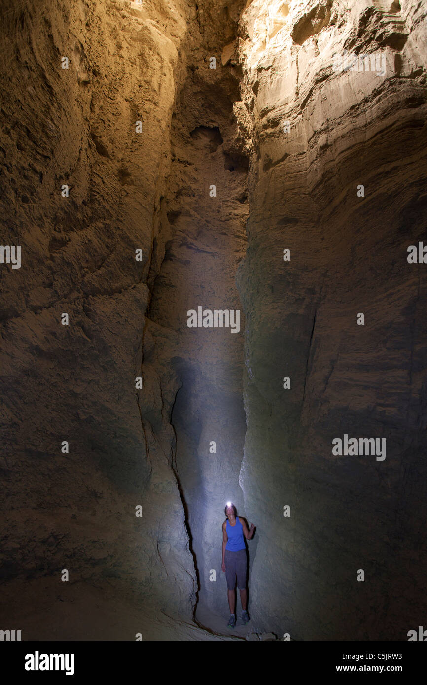 A person exploring some of the biggest mud caves in the world, Anza ...