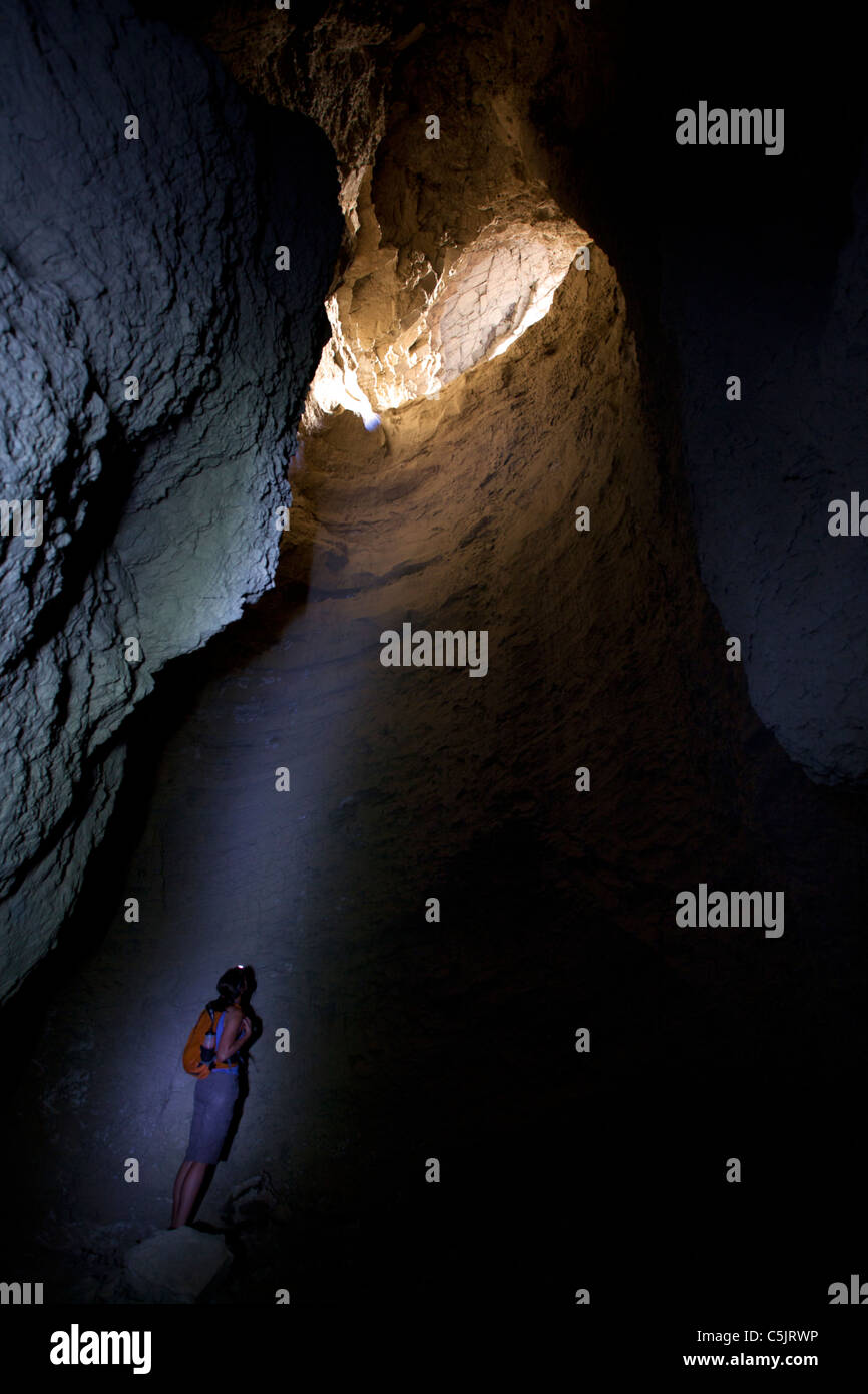 A person exploring some of the biggest mud caves in the world, Anza ...