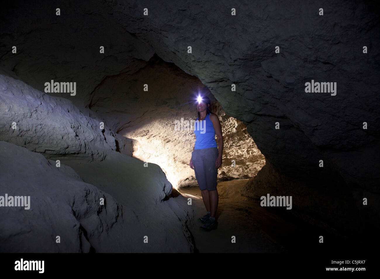 A person exploring some of the biggest mud caves in the world, Anza ...