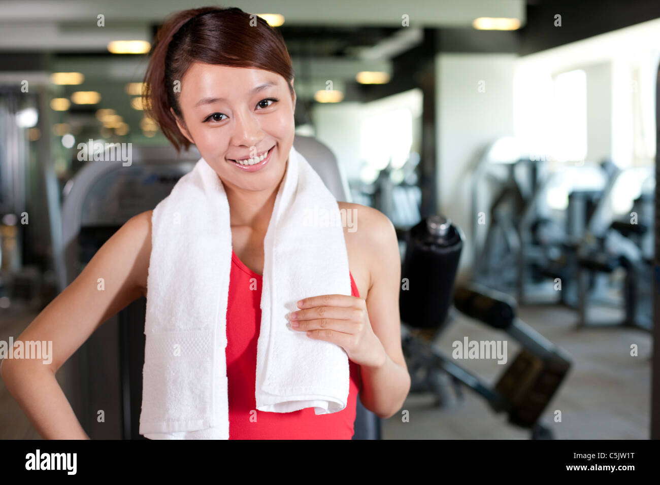 Young Woman Happy at Gym Stock Photo - Alamy