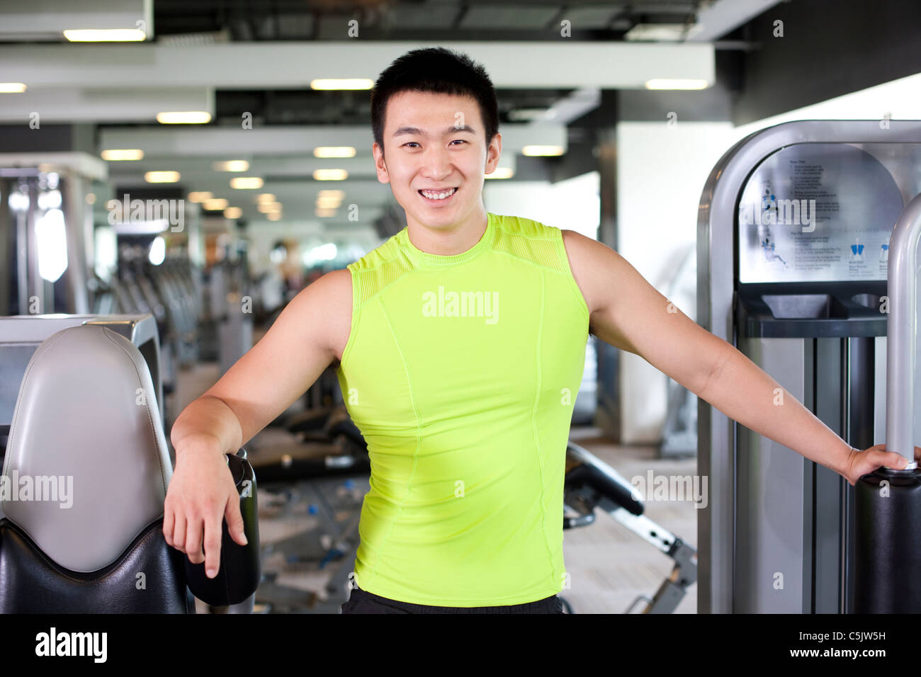 Young Man Happy at Gym Stock Photo - Alamy