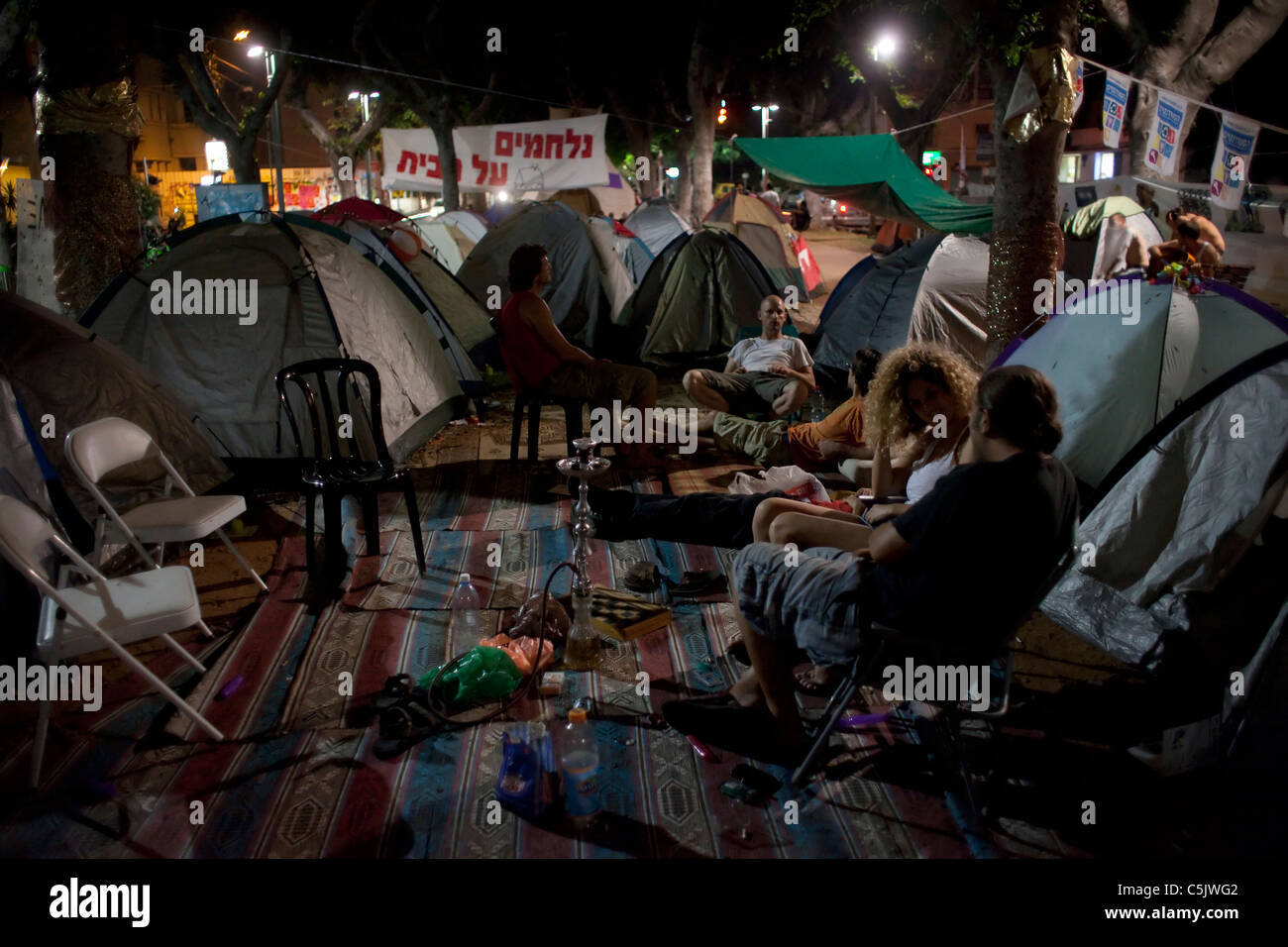 Israelis camping in the Tent City compound in Rothschild avenue in Tel ...