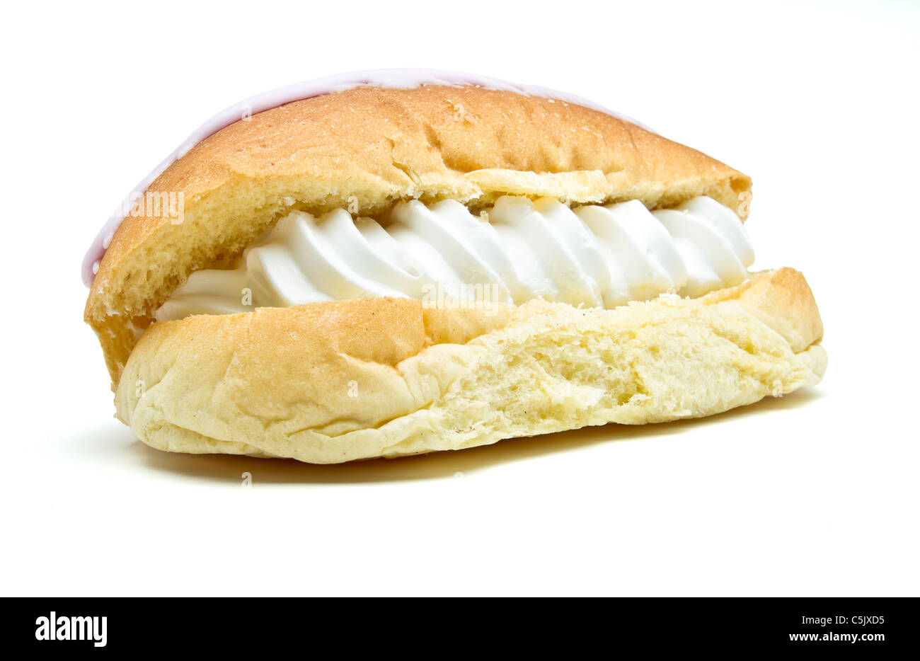 Iced split cream cake from low perspective isolated on white Stock ...