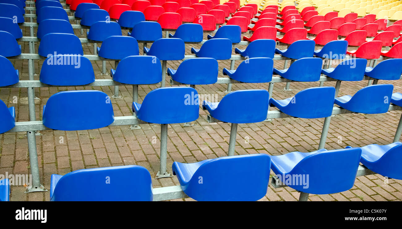 Blue against red, the winning difference made of chairs Stock Photo - Alamy