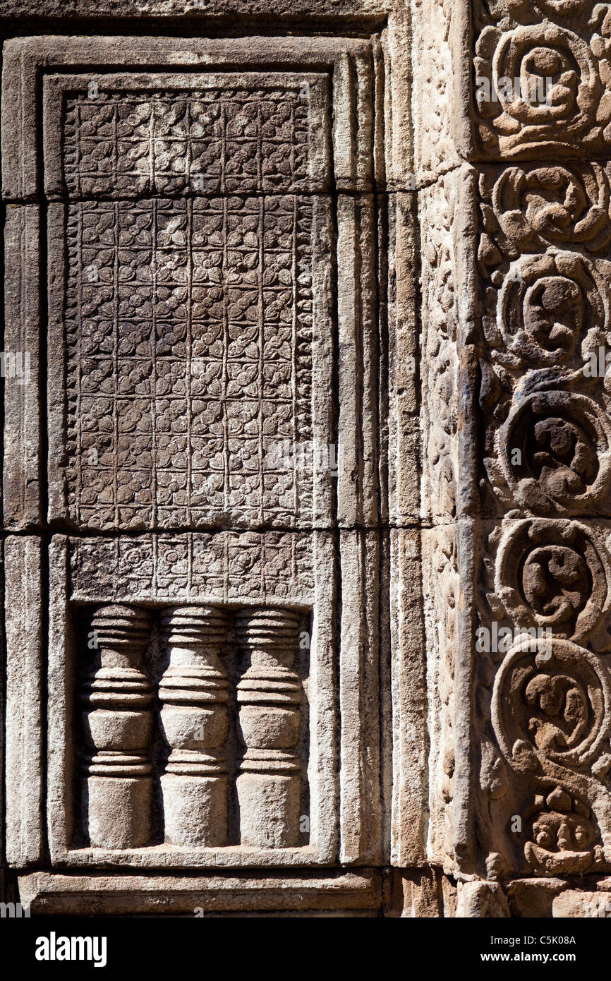 Ancient Khmer sandstone temple carving of a fake window frame - Takeo ...
