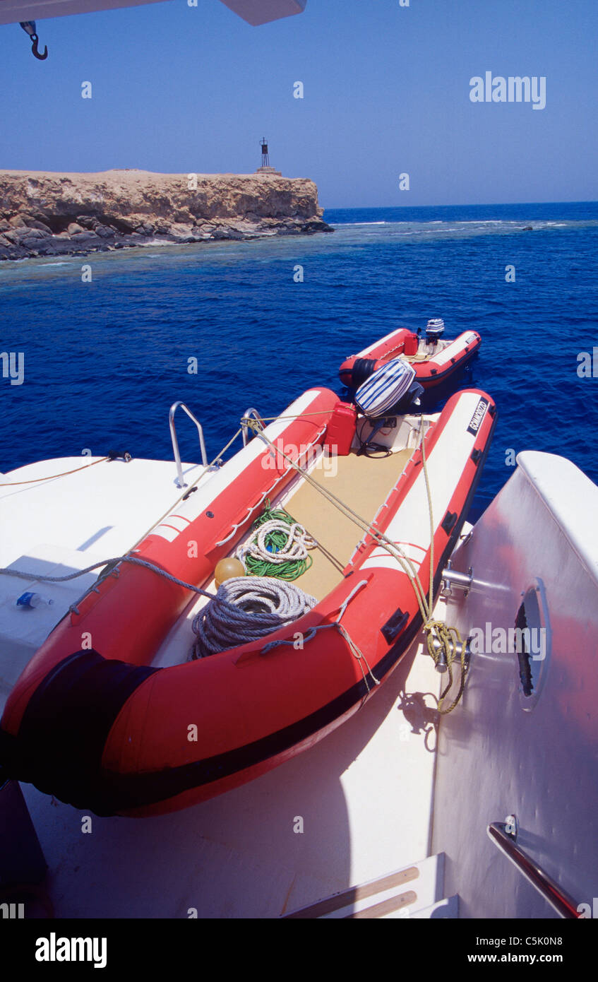 Two red inflatable boats on a liveaboard at Brother Islands, Red Sea ...