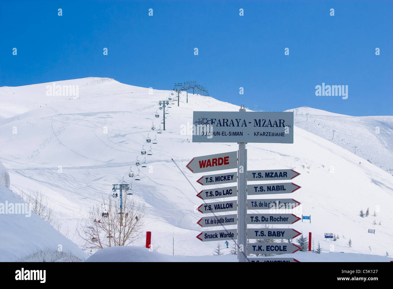 Ski track signs and chairlift in Mzaar ski resort, Faraya, Lebanon ...