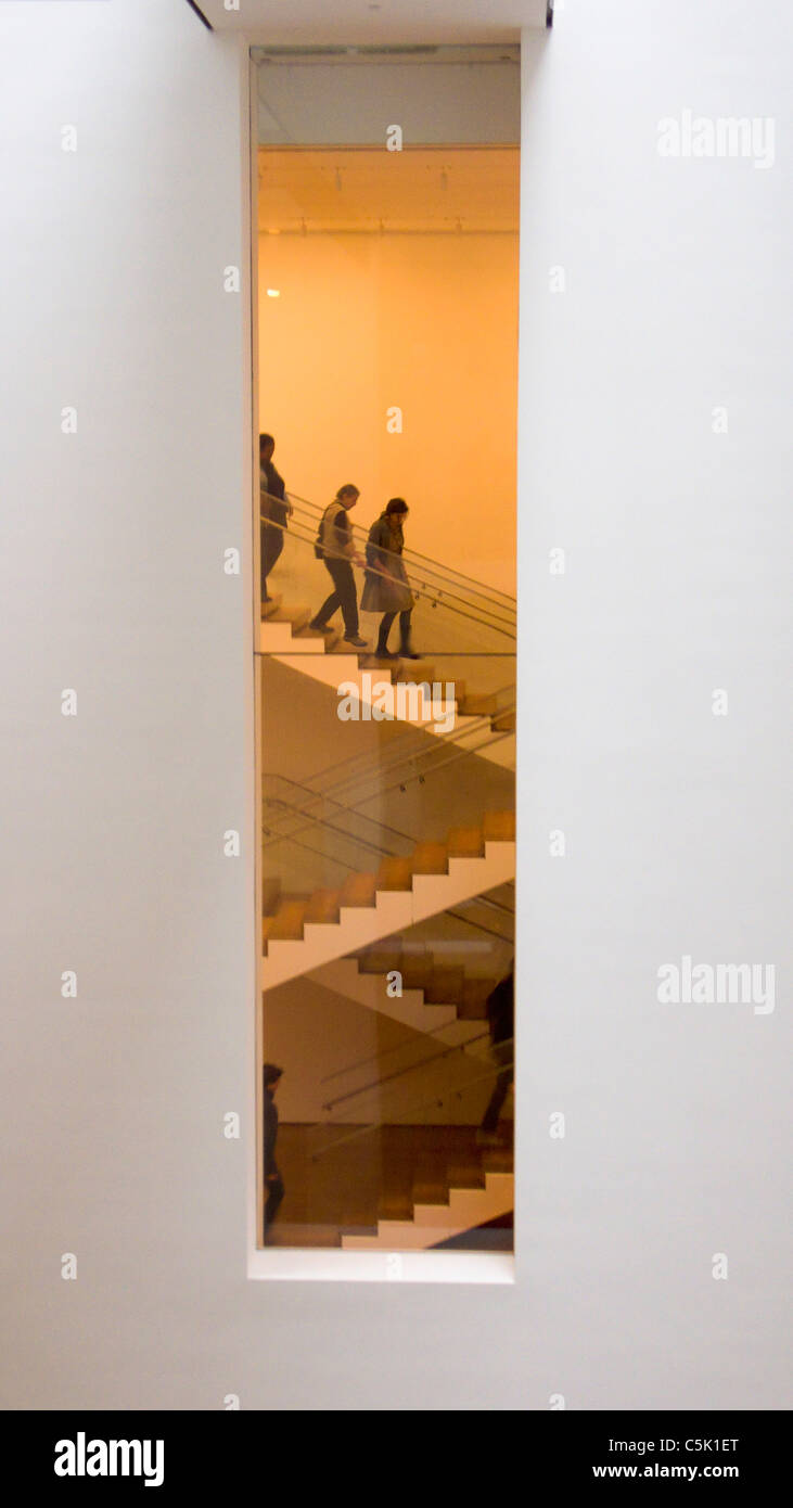 Visitors walking down the stairs in The Museum of Modern Art, MoMA, New ...
