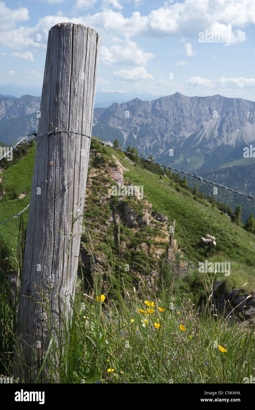 Barbed wire barrier in front of mountain panorama Stock Photo - Alamy